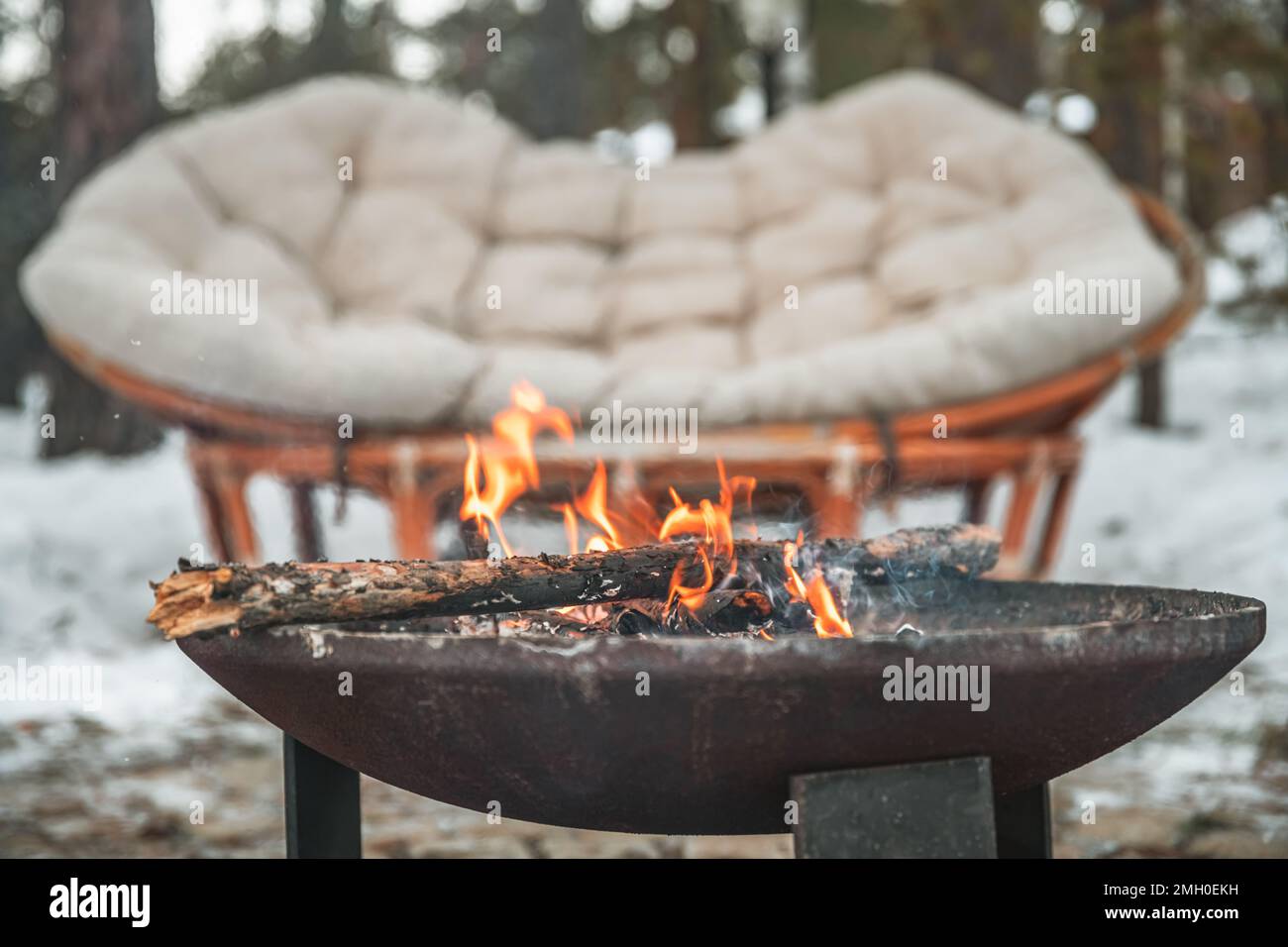 fire campfire bowl outdoors in winter, couch. cozy atmosphere Stock ...