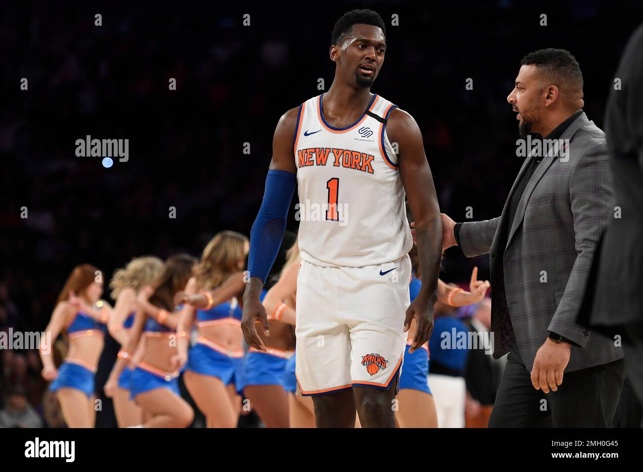 New York Knicks forward Bobby Portis (1) is escorted off the court ...