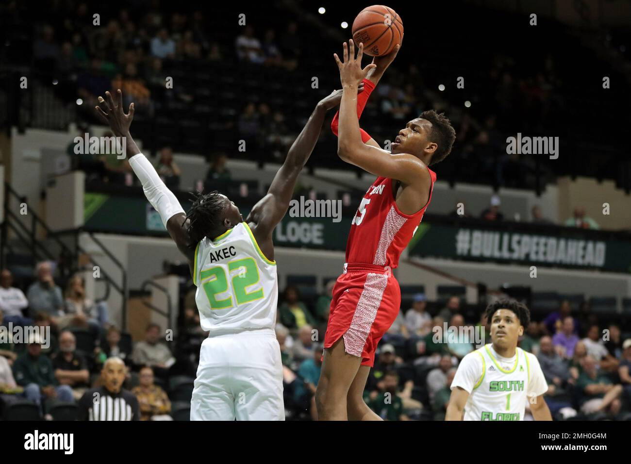 Houston's Fabian White Jr. shoots over South Florida's Madut Akec ...
