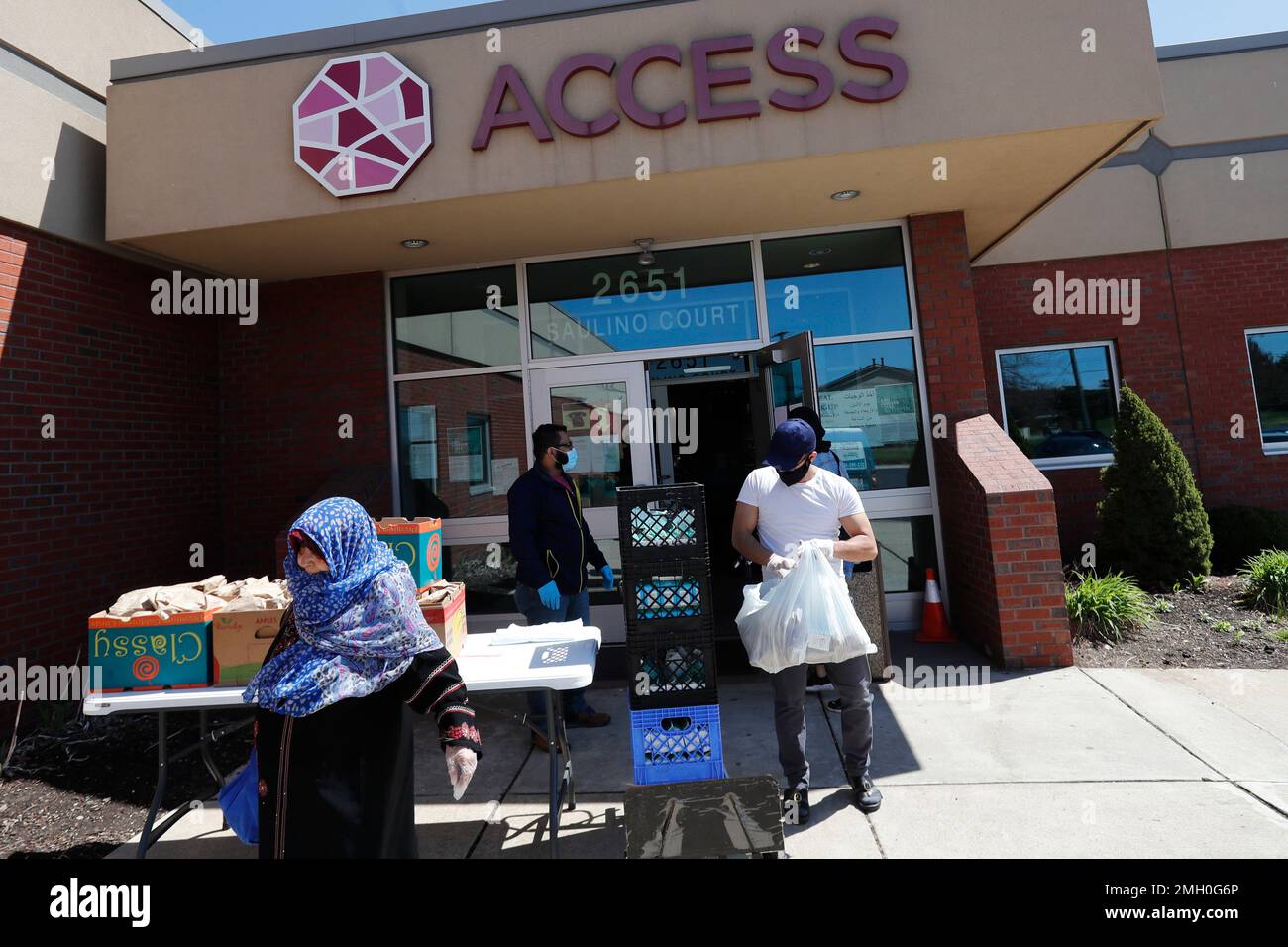 FILE - Workers at ACCESS, the Arab Community Center for Economic and ...