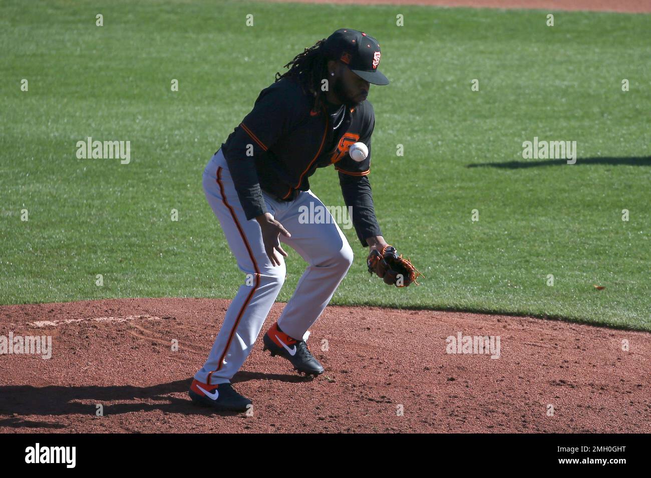 during workouts for pitchers and catchers for spring training baseball ...