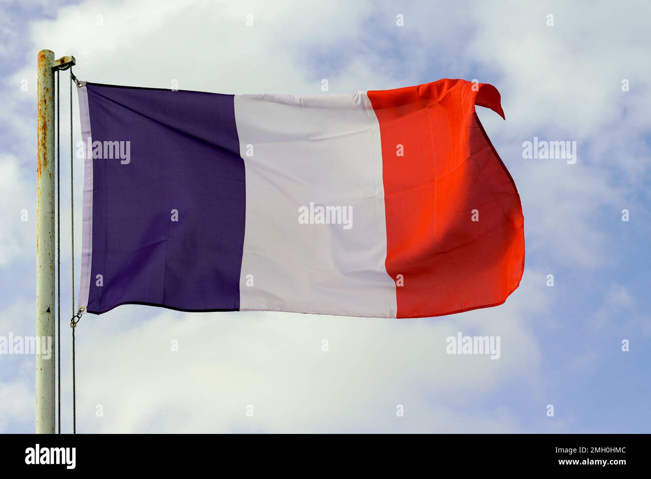 french flag tricolor red white and blue color sign on summer sky in ...