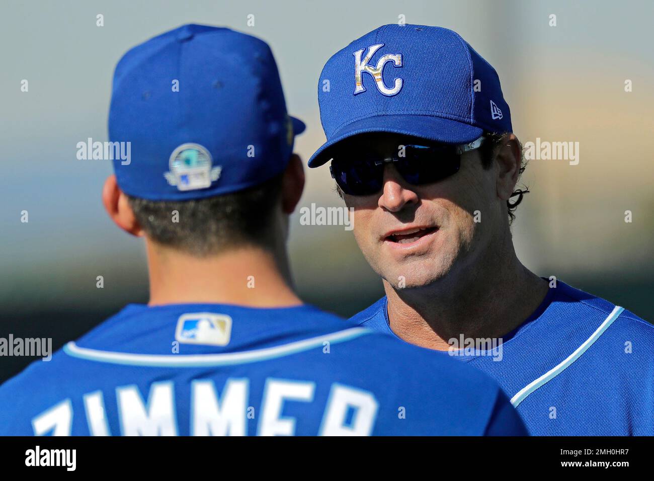 Kansas City Royals manager Mike Matheny (22) talks with pitcher Kyle ...