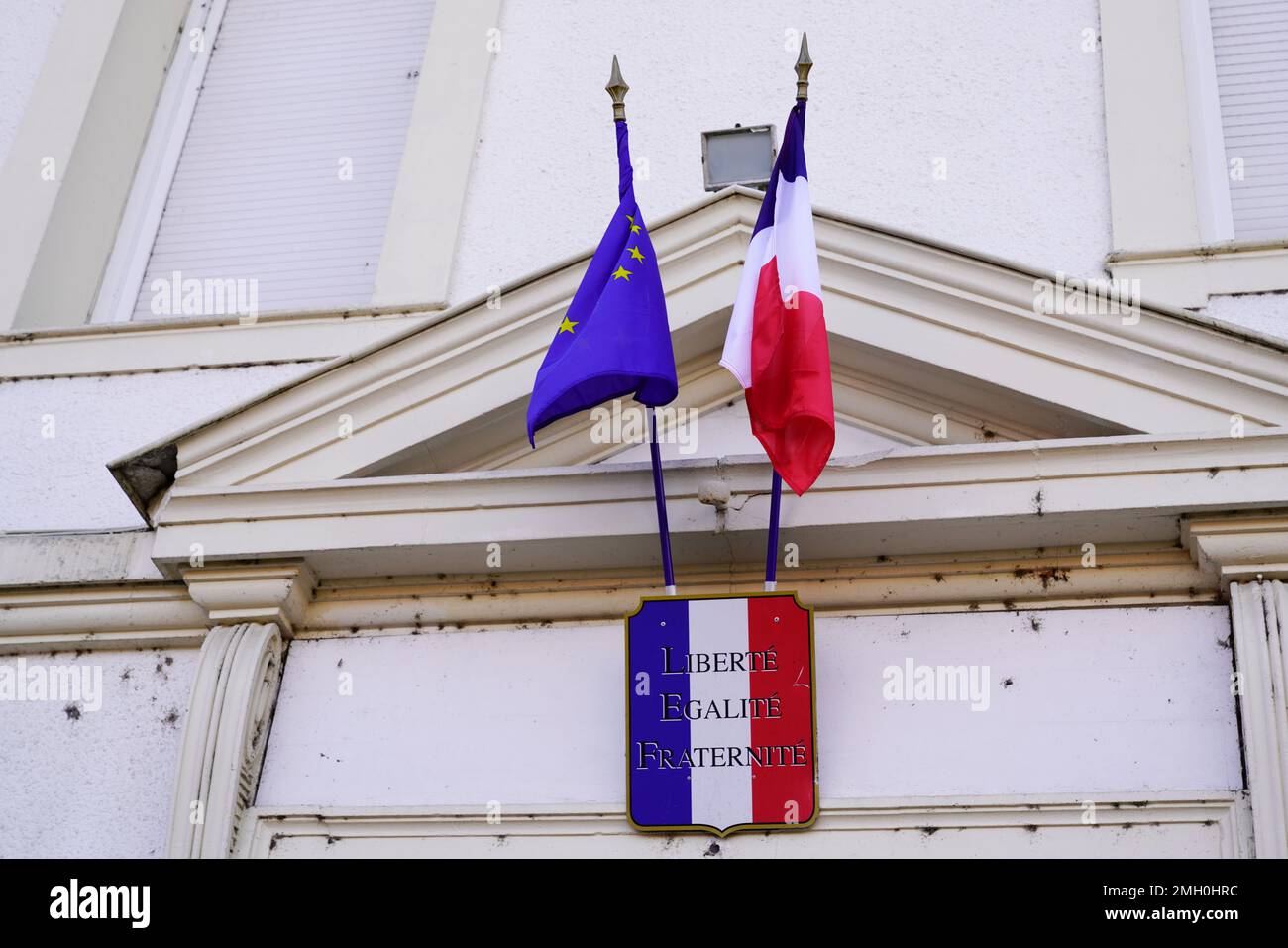 city hall facade france flag in town center on stone building with ...