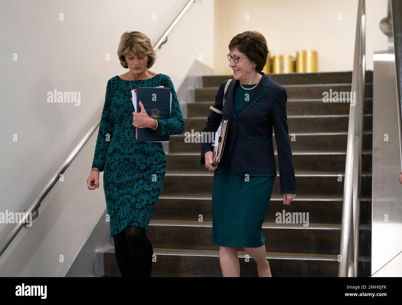 Sen. Lisa Murkowski, R-Alaska, and Sen. Susan Collins, R-Maine, walk ...