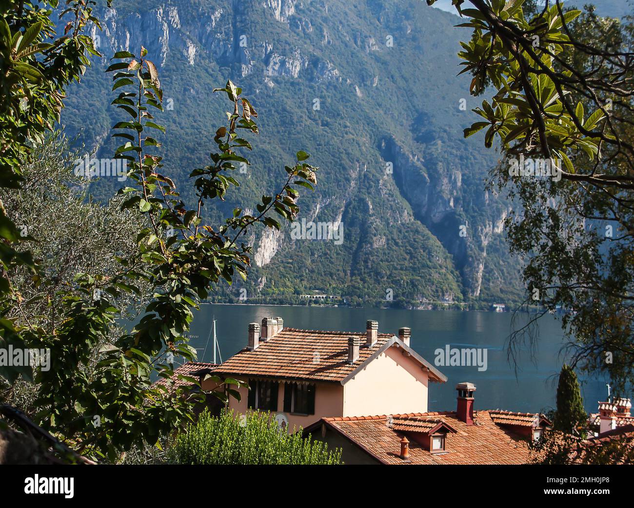 house, mountains, sky, green tree branches, lake Сomo, Bellagio, Italy ...