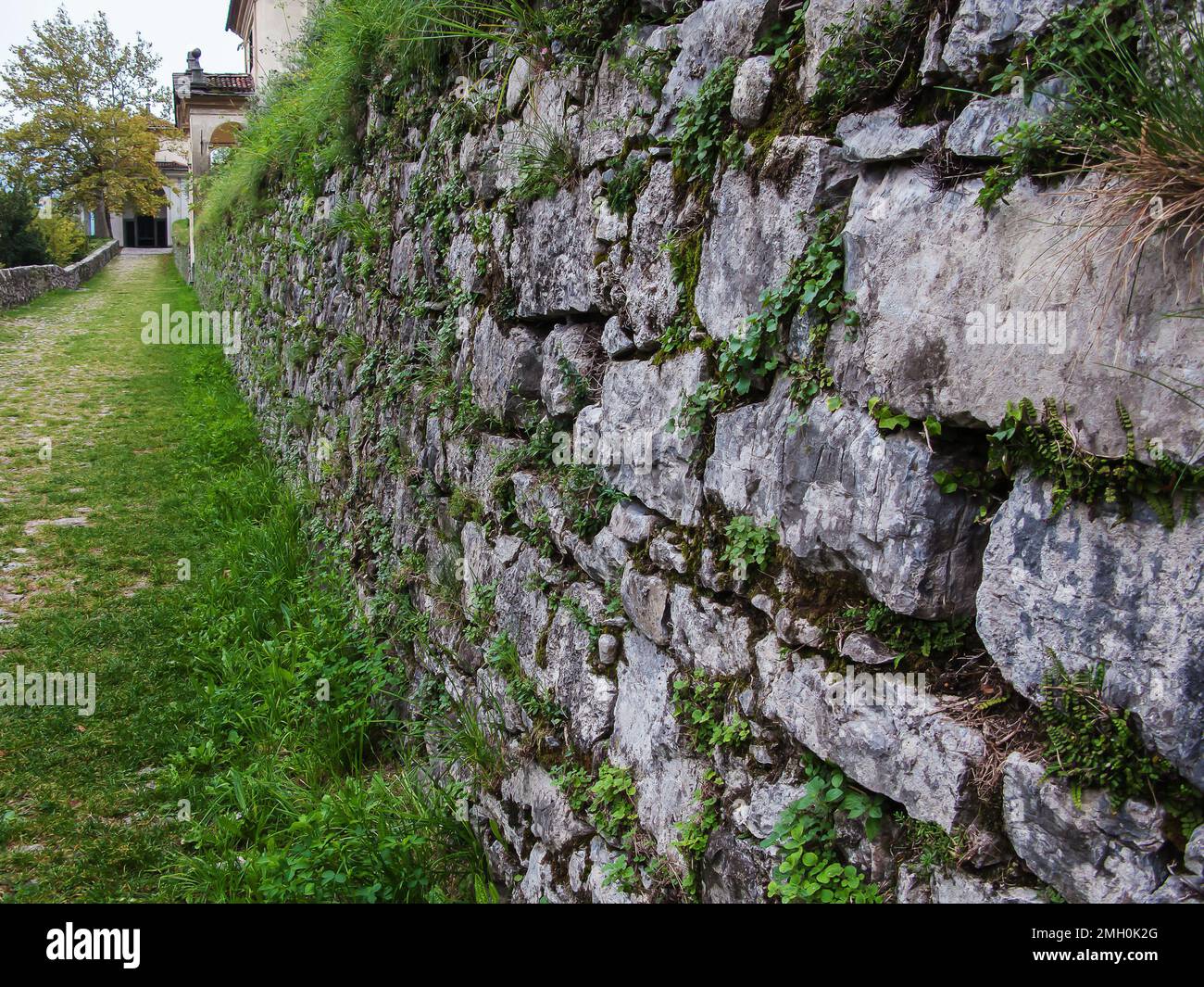 ancient stone wall on the way to Sacred Mount of Ossuccio, Our Lady of ...
