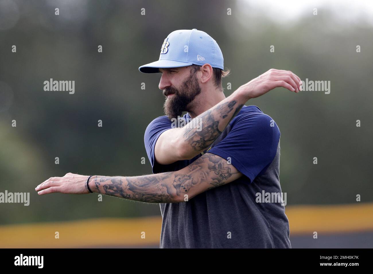 Tampa Bay Rays relief pitcher Chaz Roe (52) stretches after reporting ...