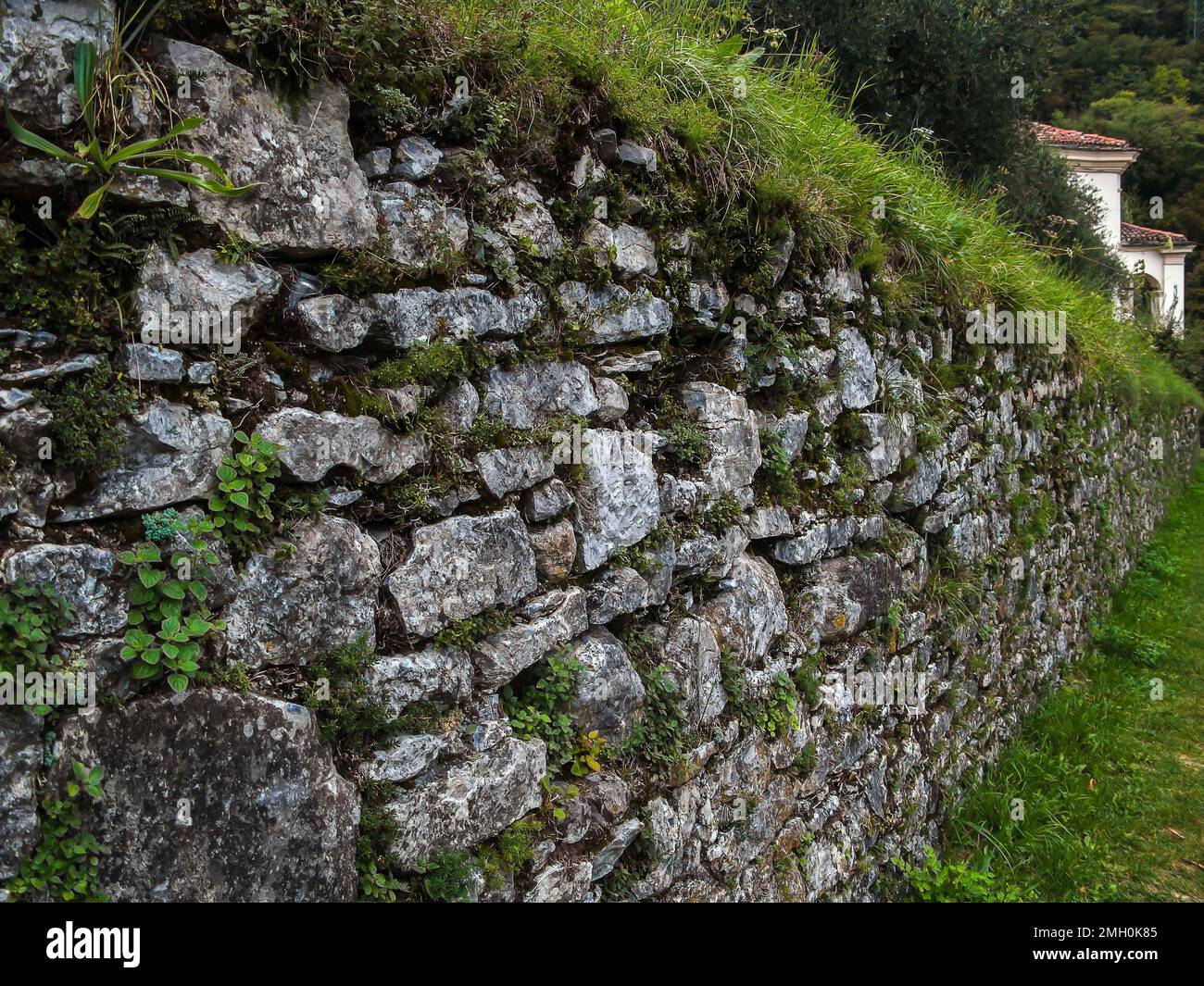 ancient stone wall on the way to Sacred Mount of Ossuccio, Our Lady of ...