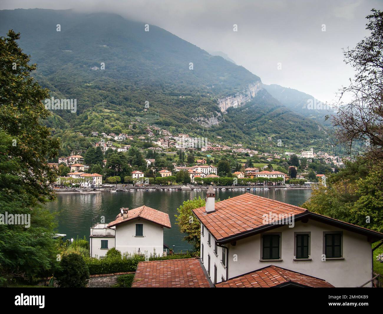 view of lake como, mountains and cloudy sky from Sacred Mount of ...