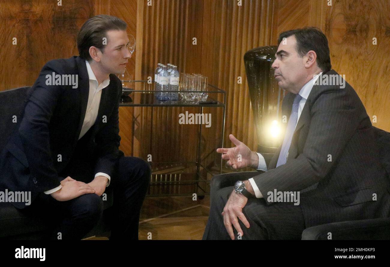 Austrian Chancellor Sebastian Kurz, left, talks with Margaritis Schinas ...