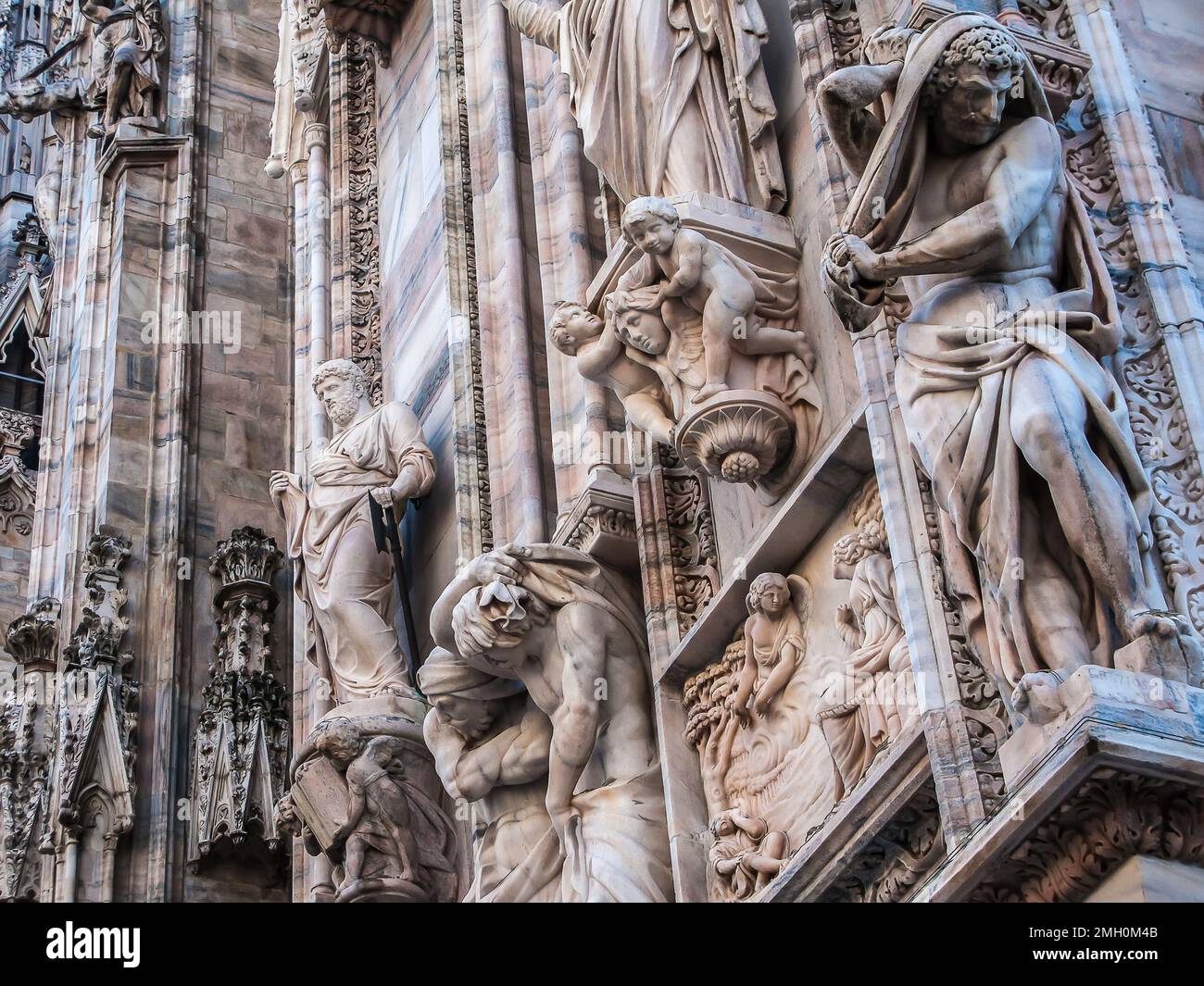 close-up marble sculptures on the walls of Duomo di Milano, Milan ...