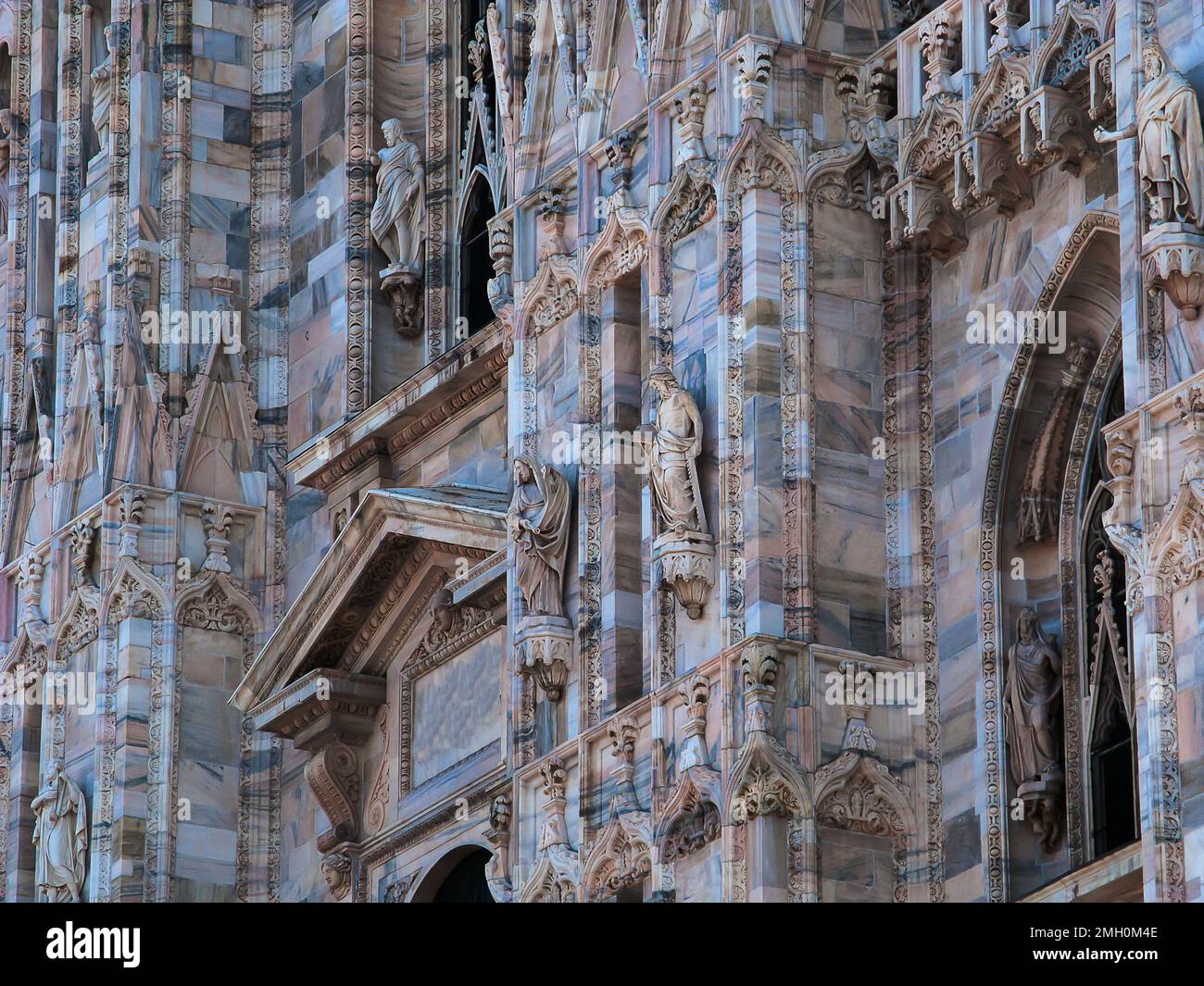 close-up marble sculptures on the walls of Duomo di Milano, Milan ...