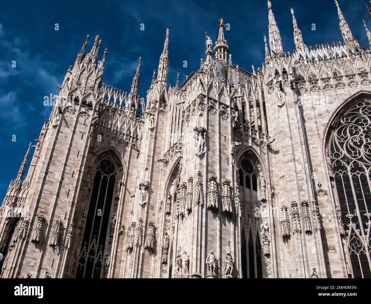 Duomo di Milano on background of blue sky at sunny day, Milan, Lombardy ...