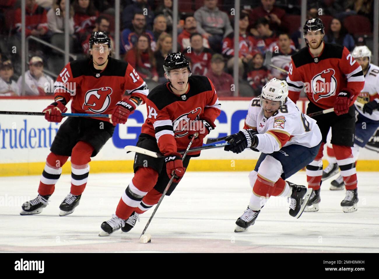 Florida Panthers left wing Mike Hoffman (68) checks New Jersey Devils ...