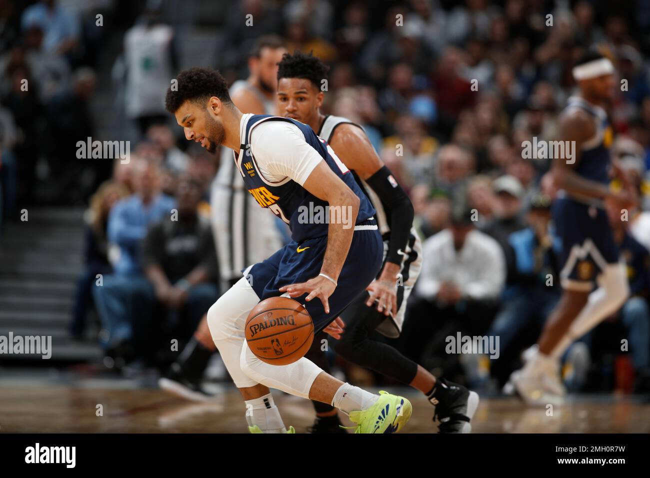 Denver Nuggets guard Jamal Murray (27) and San Antonio Spurs guard ...