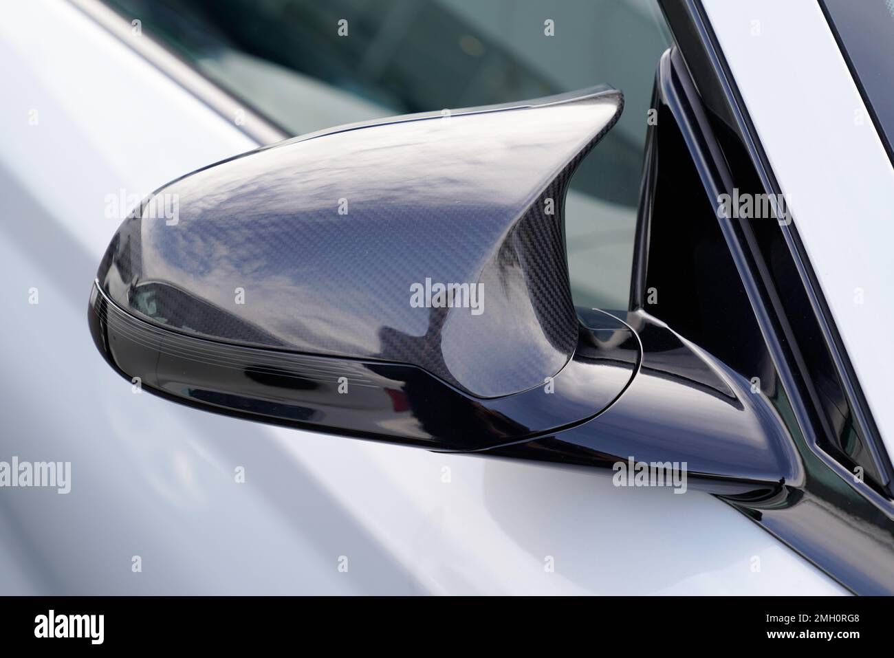 Close-up view of exterior sport car side mirror Stock Photo - Alamy