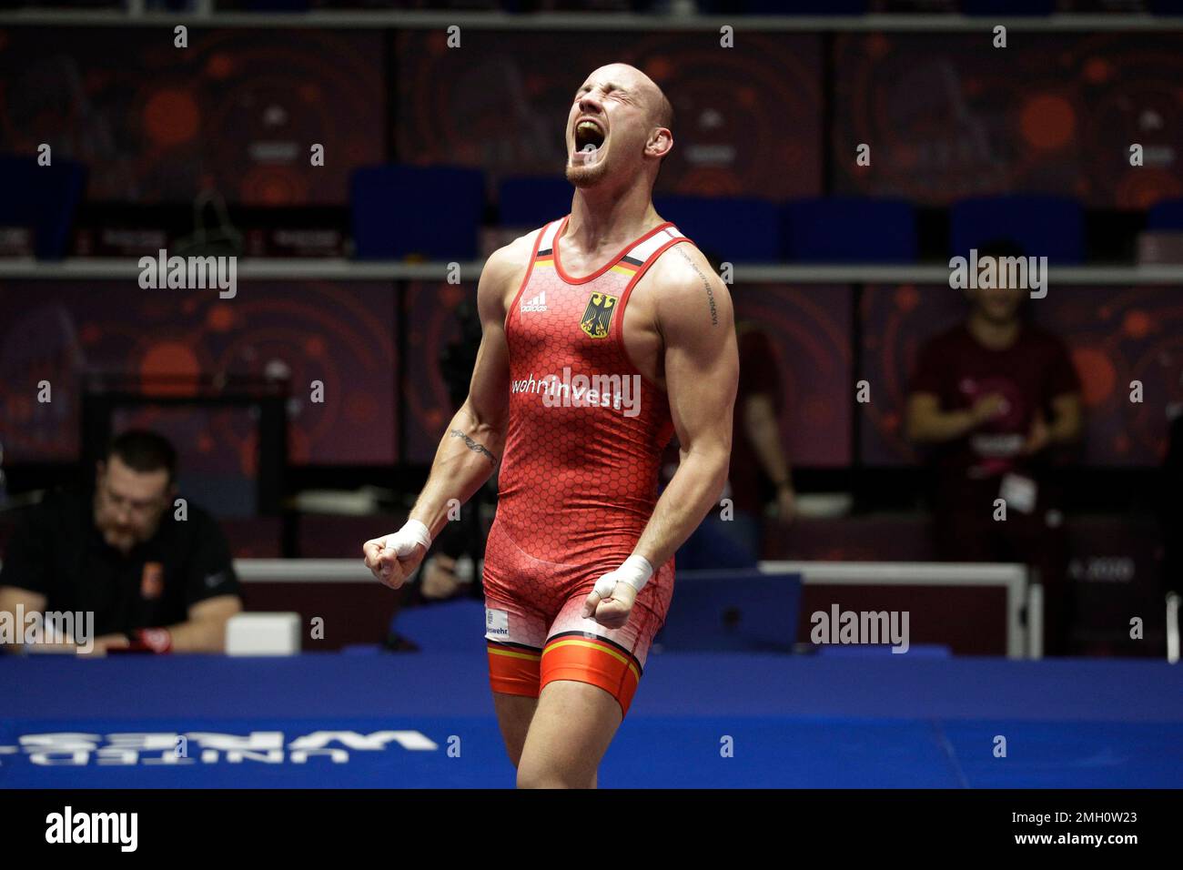 Germany's Frank Staebler celebrates after winning against Russia's Adam ...