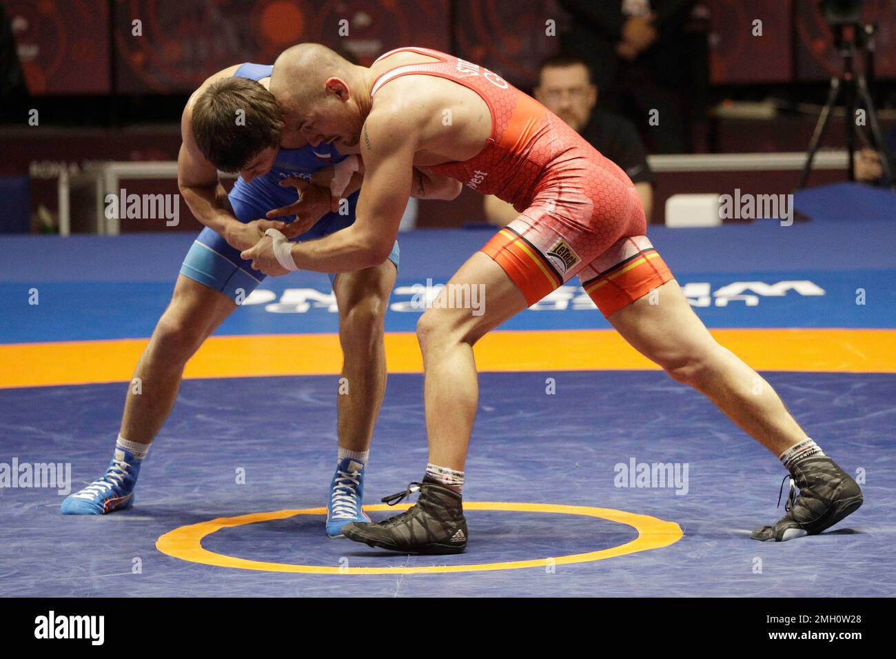 Germany's Frank Staebler, right, and Russia's Adam Kurak fight during ...