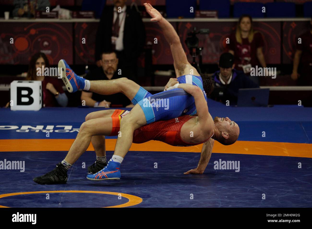 Germany's Frank Staebler, bottom, and Russia's Adam Kurak fight during ...