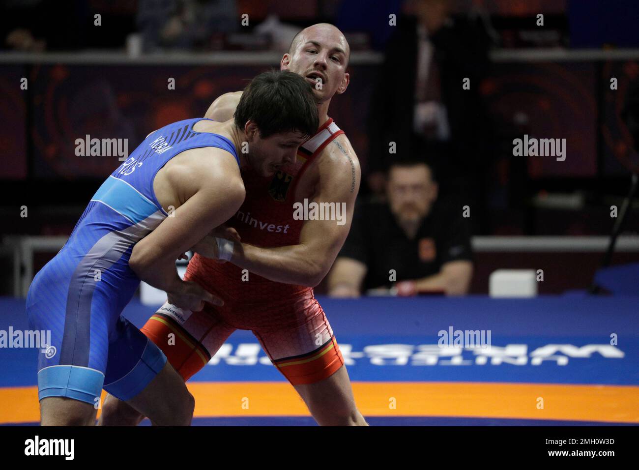 Germany's Frank Staebler, right, and Russia's Adam Kurak fight during ...
