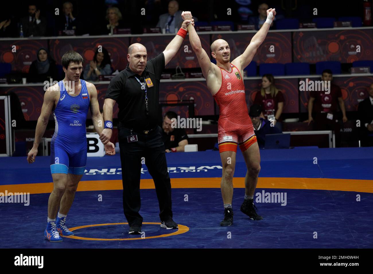 Germany's Frank Staebler, right, celebrates after winning against ...