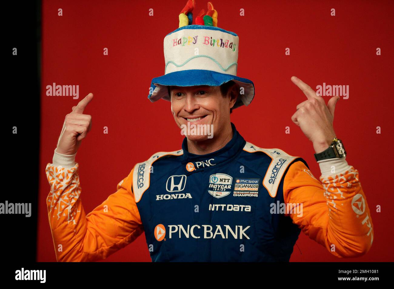 IndyCar driver Scott Dixon poses for photos during IndyCar Media Day ...