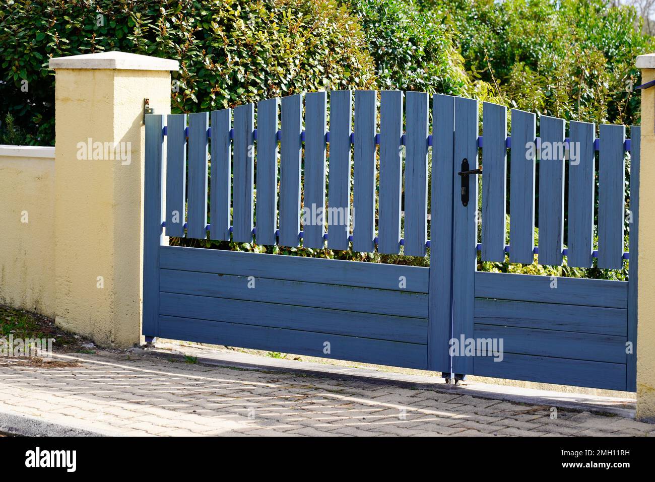 blue gate and steel entrance door property house car access Stock Photo ...