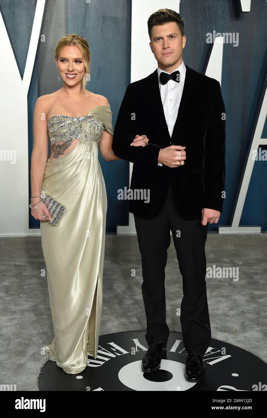 Scarlett Johansson, left, and Colin Jost arrive at the Vanity Fair ...