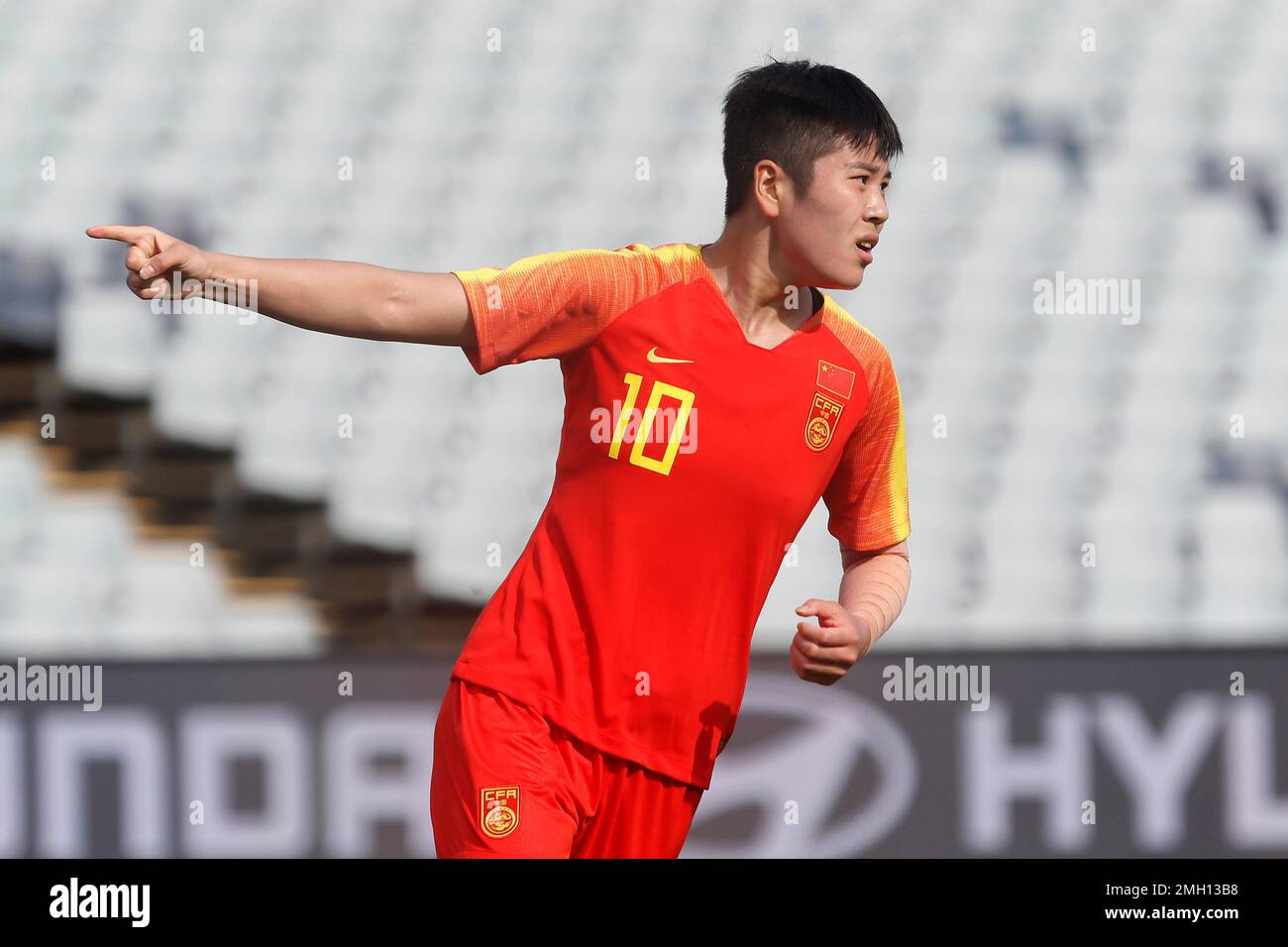 Li Ying of China scores against Taiwan during their Olympic soccer ...