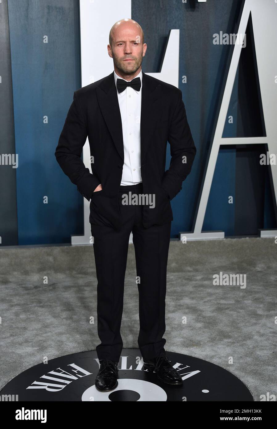 Jason Statham arrives at the Vanity Fair Oscar Party on Sunday, Feb. 9 ...