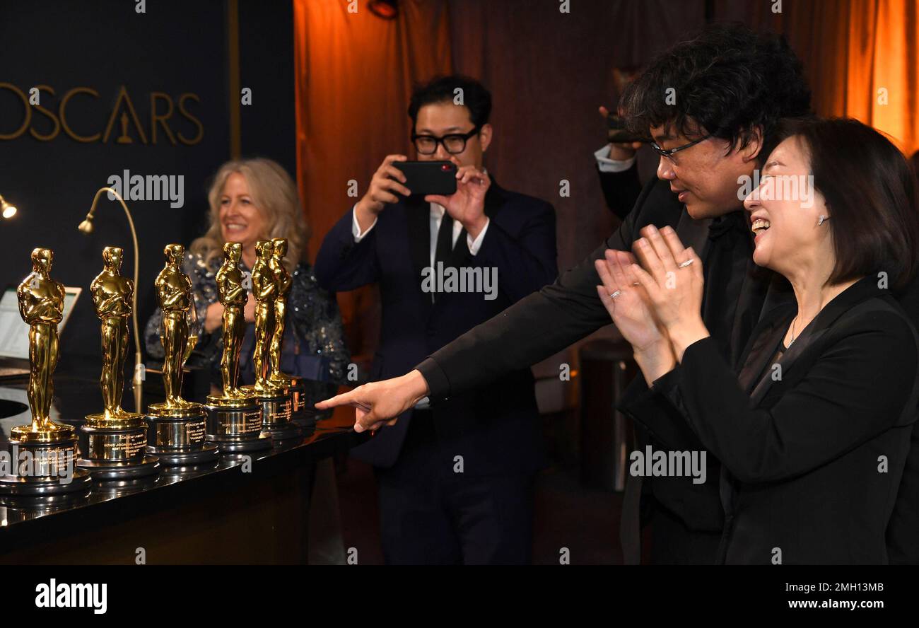 Han Jin Won, from left, Bong Joon-ho, and Kwak Sin Ae with the Oscars ...
