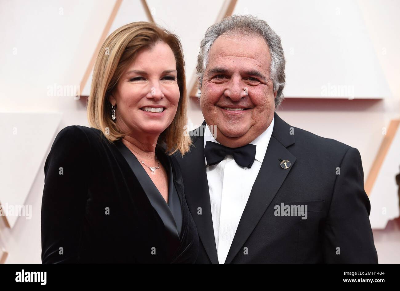 Ann Gianopulos, left, and Jim Gianopulos arrive at the Oscars on Sunday ...