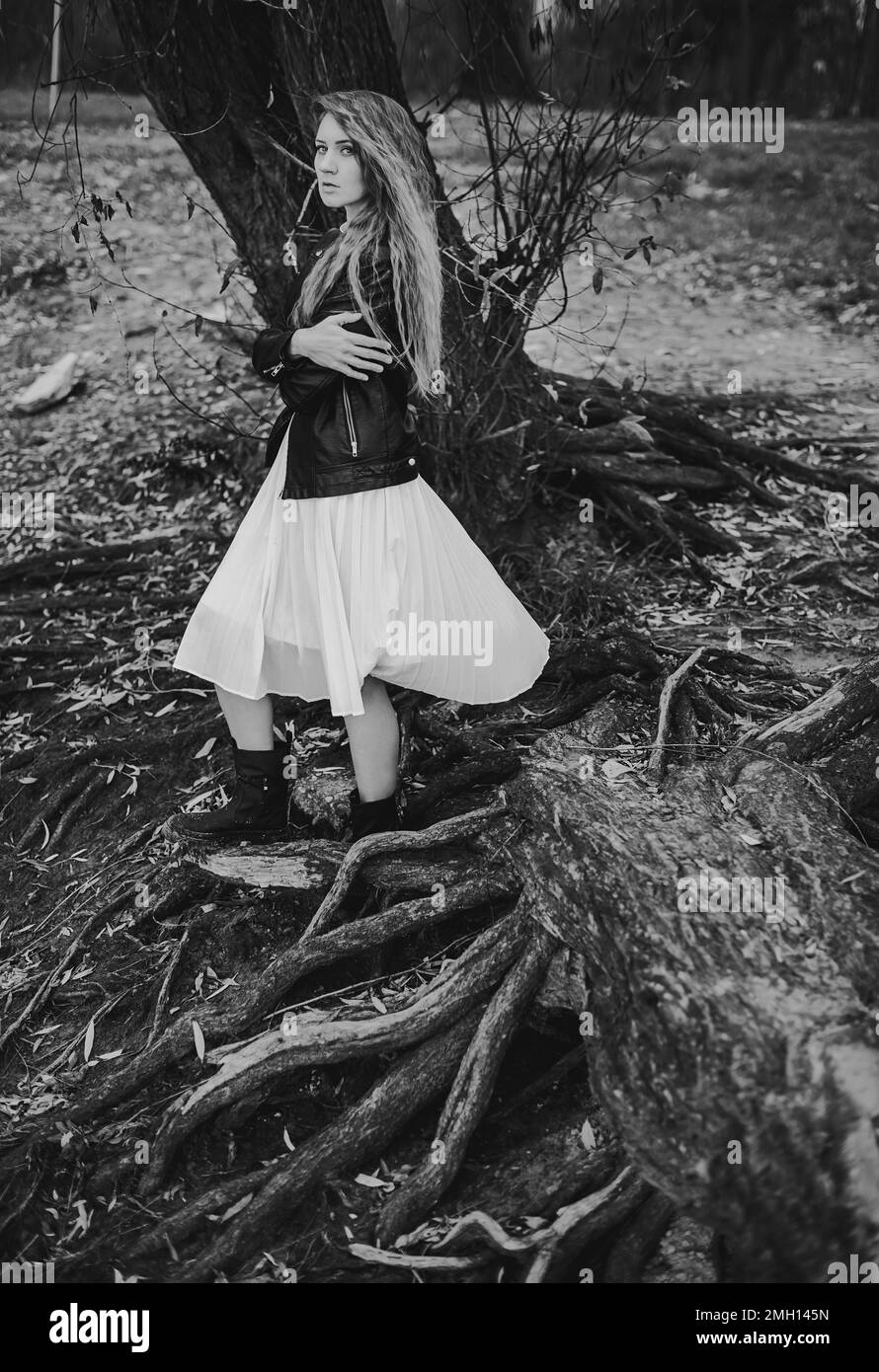 Woman tree hugging autumn Black and White Stock Photos & Images - Alamy