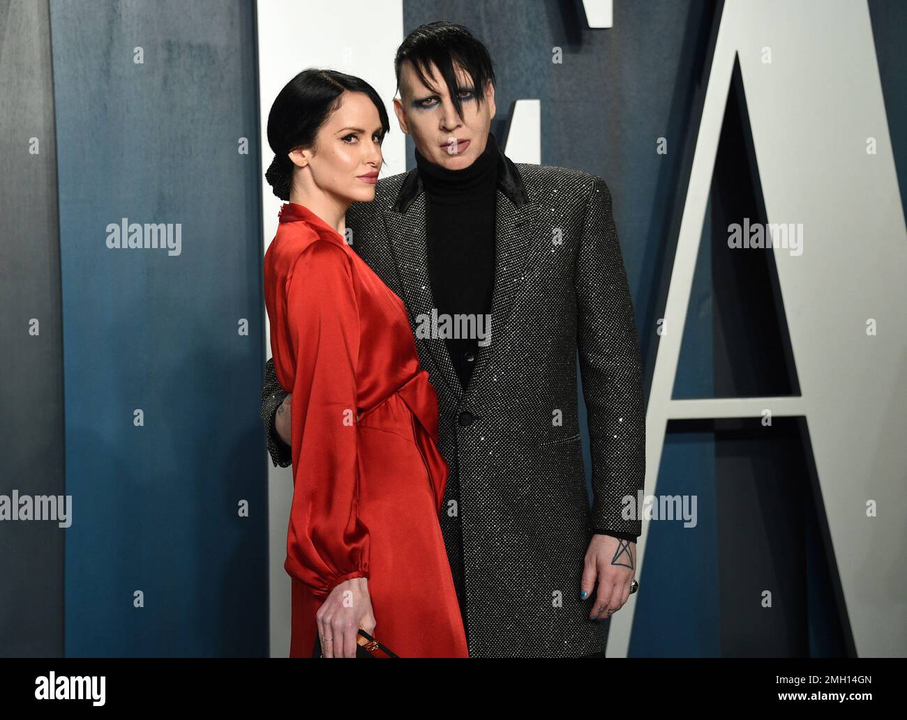 Lindsay Usich, left, and Marilyn Manson arrive at the Vanity Fair Oscar ...