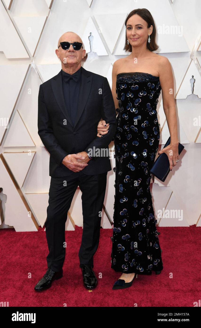 Bernie Taupin, left, and Heather Lynn Hodgins Kidd arrive at the Oscars ...