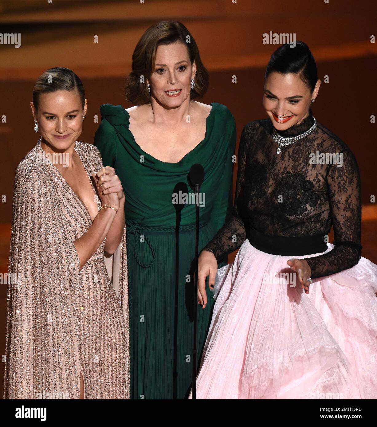 Brie Larson, from left, Sigourney Weaver and Gal Gadot introduce a performance by maestro Eimear ...