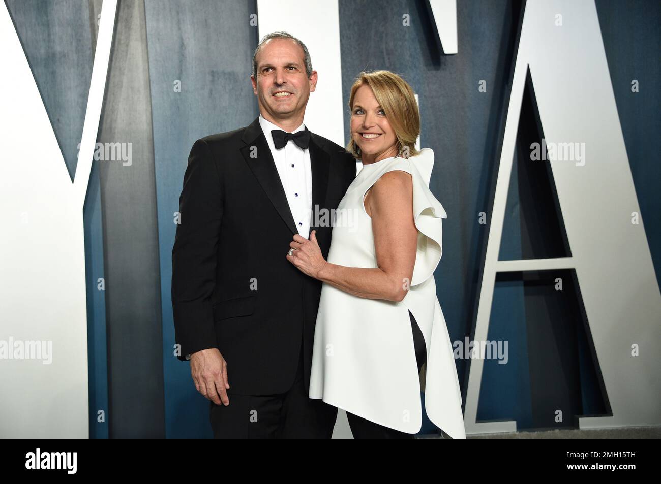 John Molner, left, and Katie Couric arrive at the Vanity Fair Oscar ...