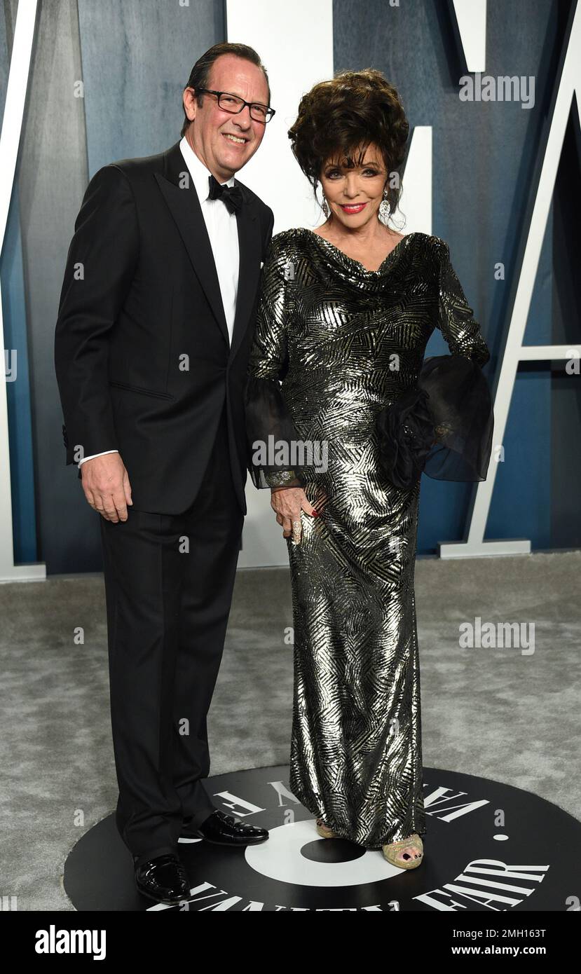 Percy Gibson, left, and Joan Collins arrive at the Vanity Fair Oscar ...