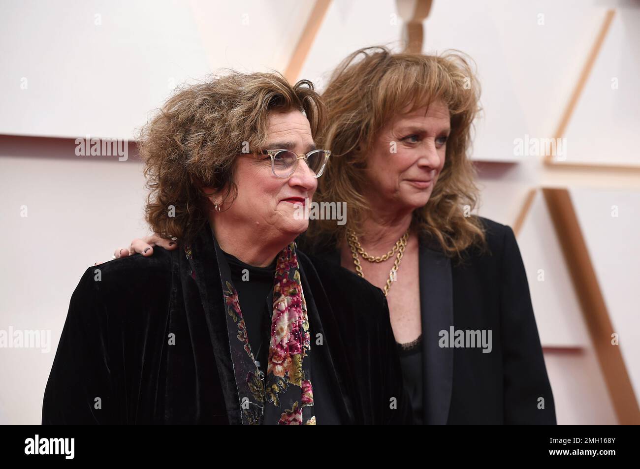 Barbara Ling, left, arrives at the Oscars on Sunday, Feb. 9, 2020, at ...
