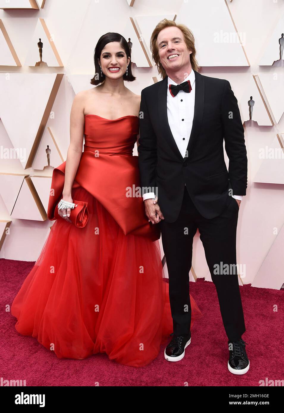 Kiana Madani and director Bryan Buckley arrive at the Oscars on Sunday ...