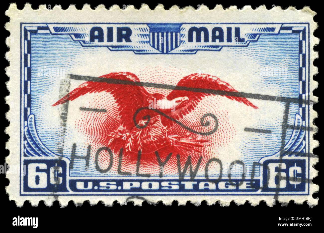 USA - CIRCA 1938: A Stamp printed in USA shows the Eagle holding Shield ...