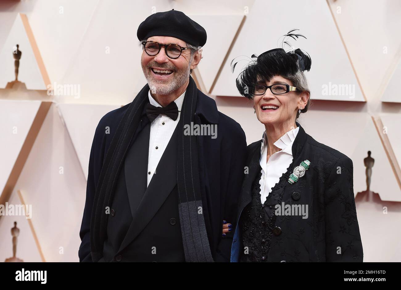Dennis Gassner, left, and Amy Gassner arrive at the Oscars on Sunday ...