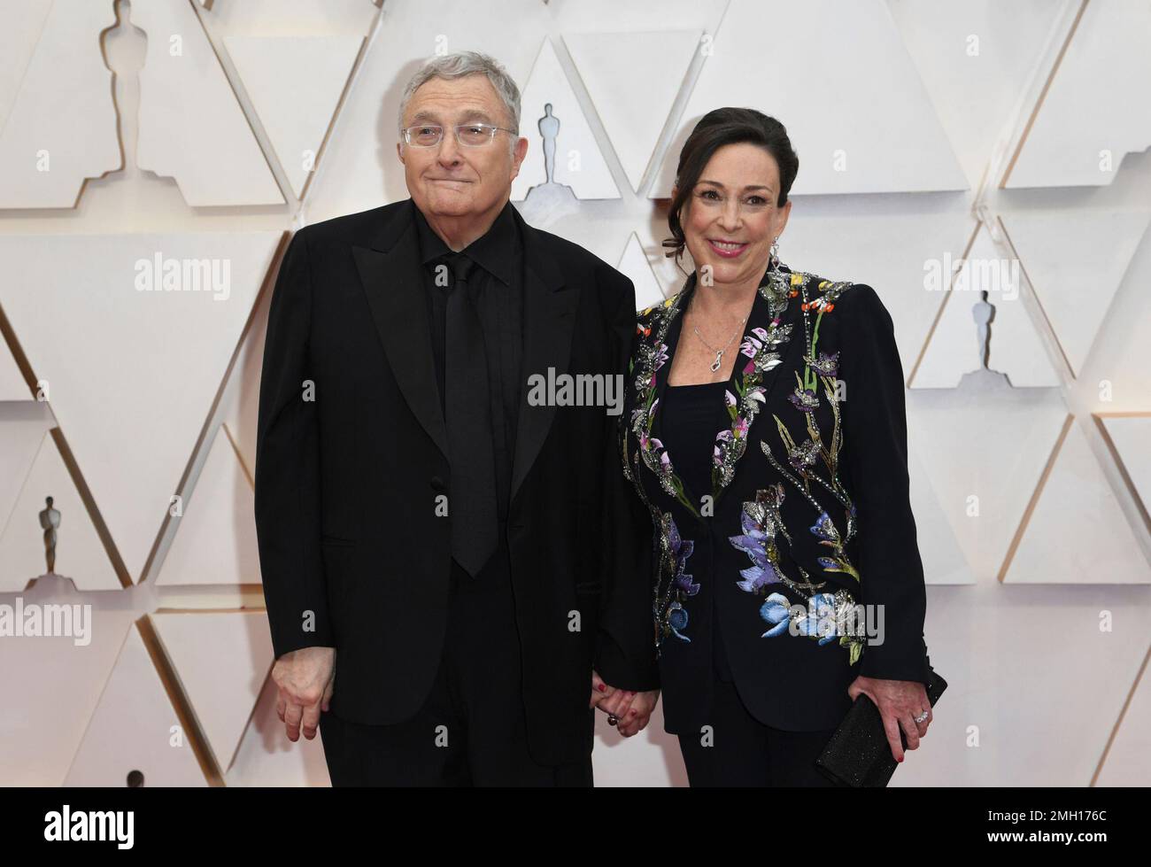 Randy Newman, left, and Gretchen Preece arrive at the Oscars on Sunday ...