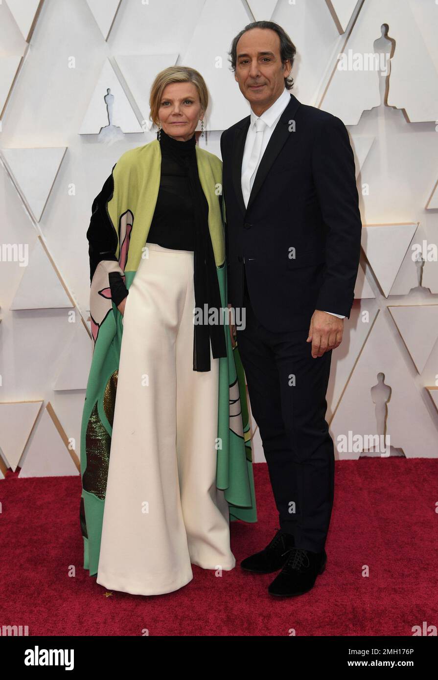Dominique Lemonnier, left, and Alexandre Desplat arrive at the Oscars ...
