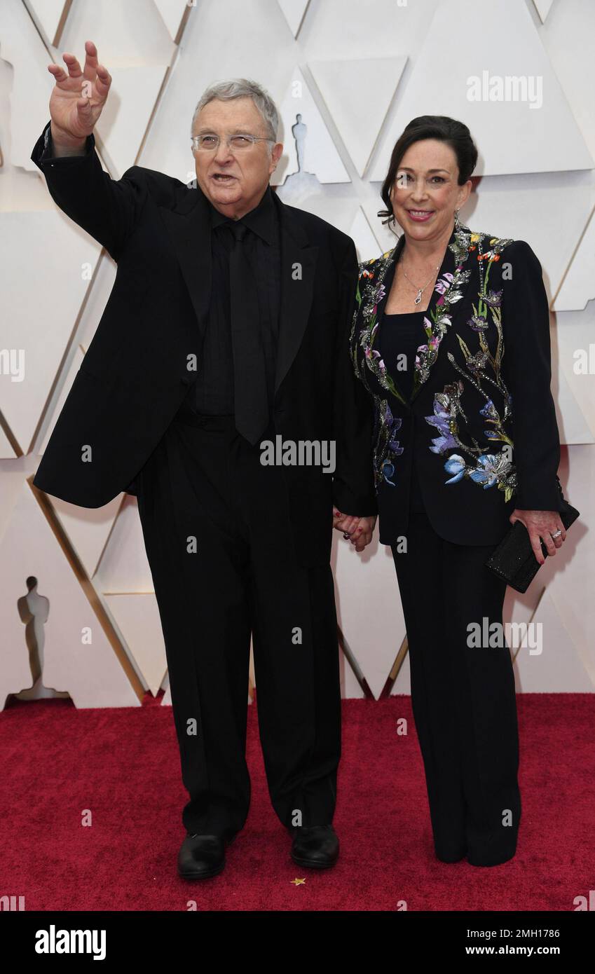 Randy Newman, left, and Gretchen Preece arrive at the Oscars on Sunday ...
