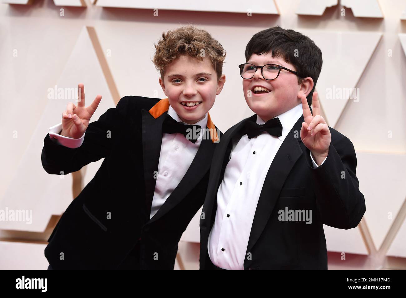 Roman Griffin Davis, left, and Archie Yates arrive at the Oscars on ...