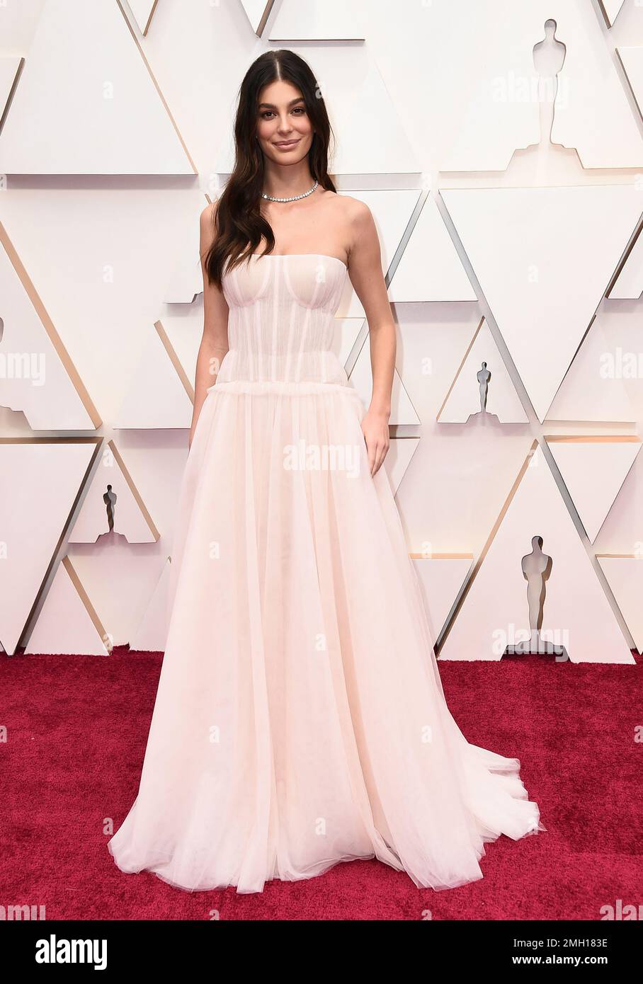 Camila Morrone arrives at the Oscars on Sunday, Feb. 9, 2020, at the ...