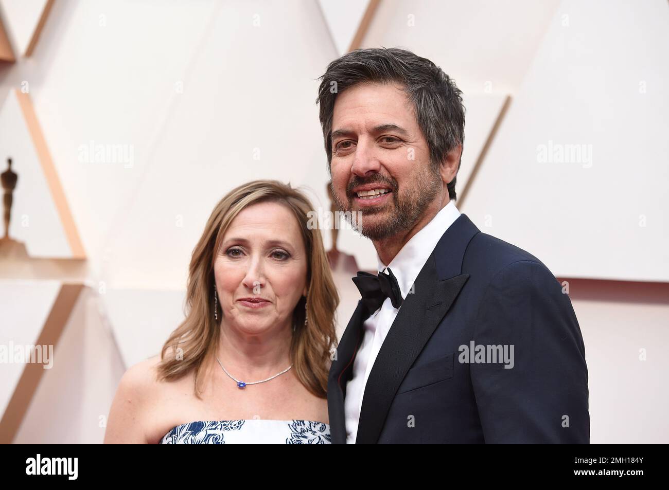 Anna Romano, left, and Ray Romano arrive at the Oscars on Sunday, Feb ...