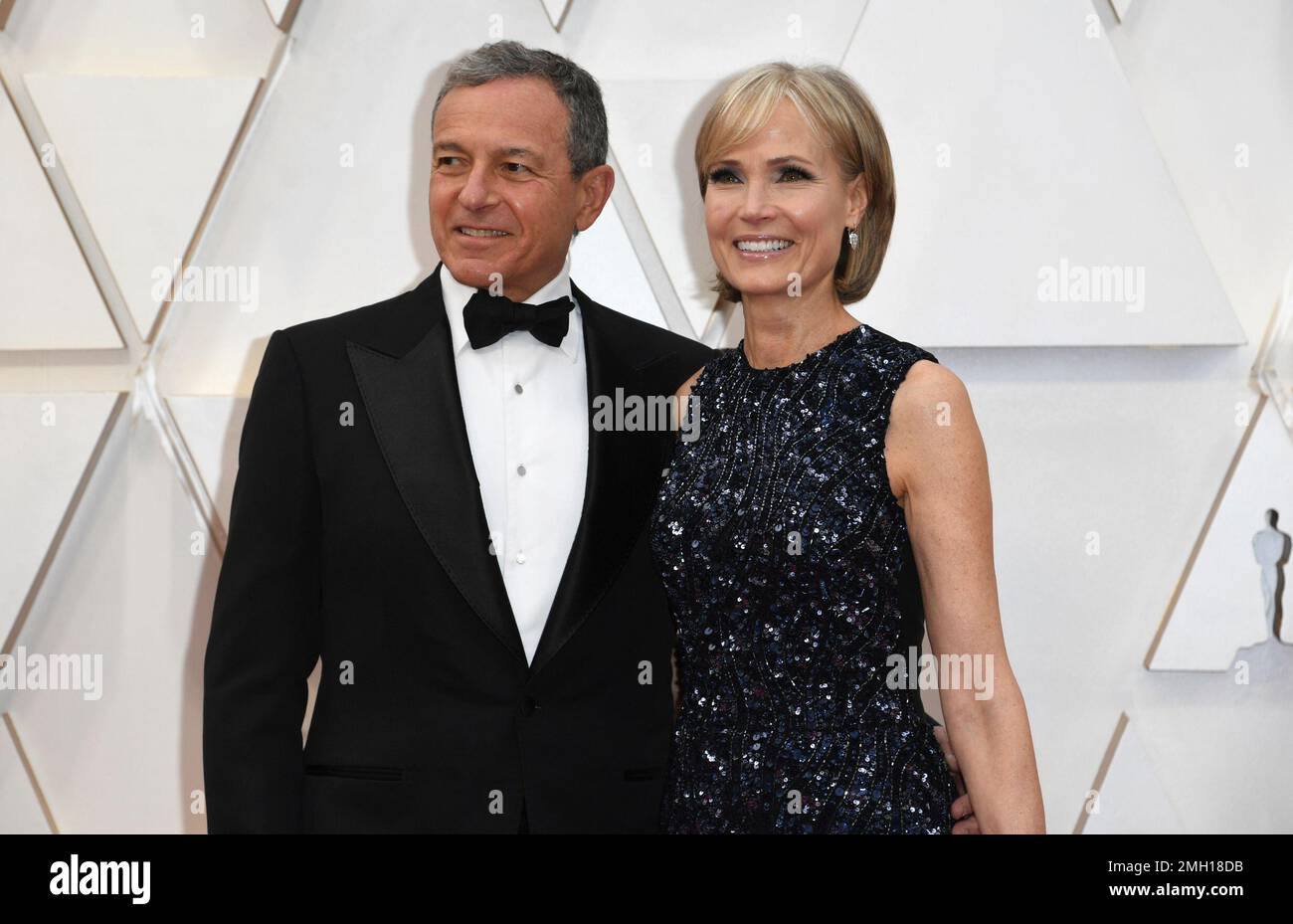 Bob Iger, left, and Willow Bay arrive at the Oscars on Sunday, Feb. 9 ...